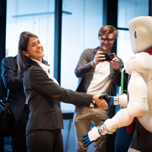 The Ambassador of Canada to Norway greets humanoid robot EVE at Halodi ...